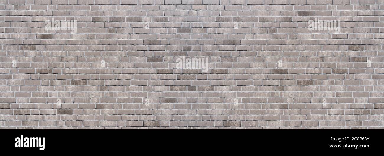 Panoramic brick wall background made of gray bricks Stock Photo - Alamy