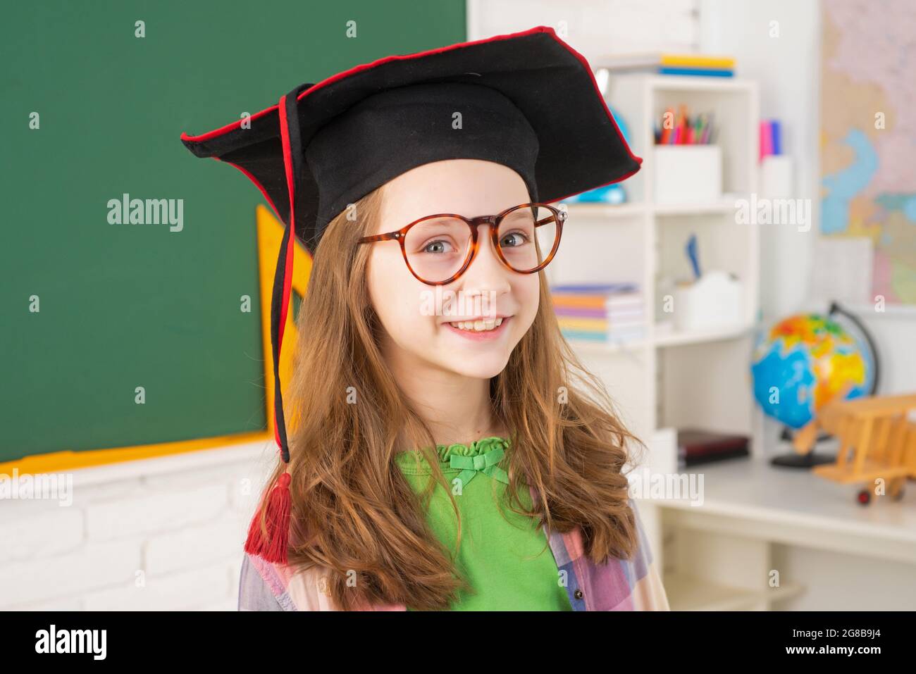 Elementary school learning and kids concept. Little student in ...