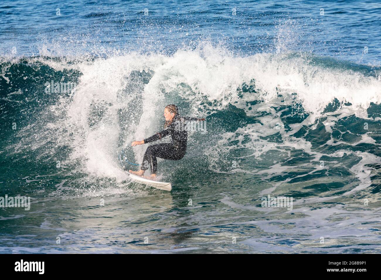 Teenager Surfing Wetsuit Girl High Resolution Stock Photography and ...