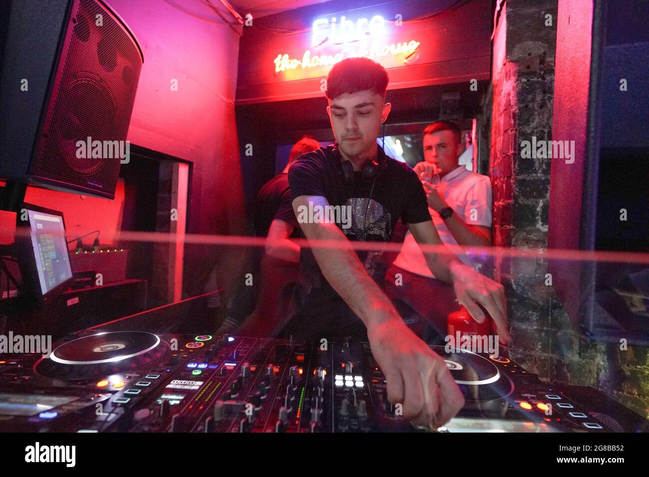Dj playing in bar hi-res stock photography and images - Alamy