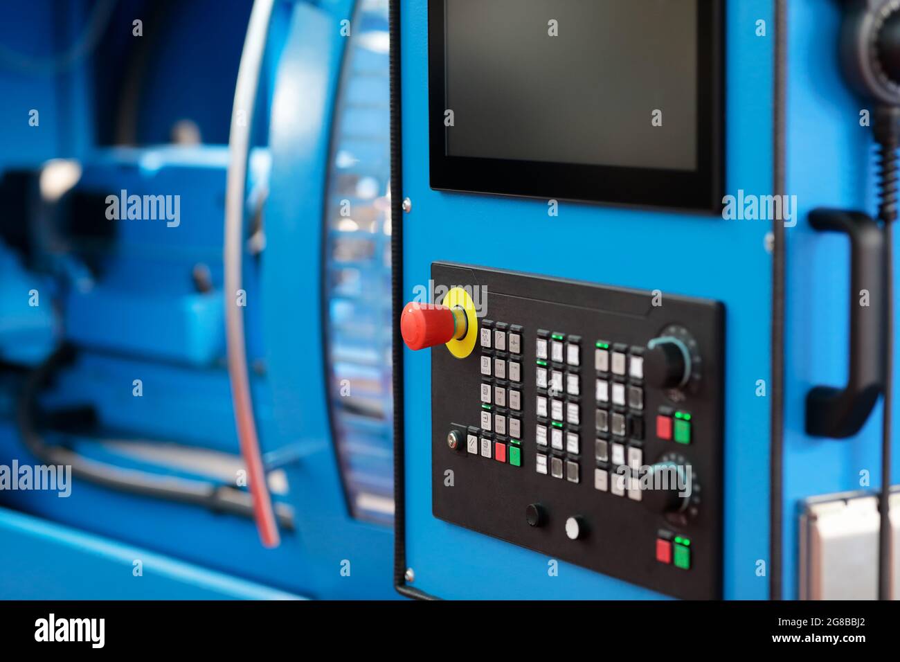 Industrial machining center with CNC control panel. Selective focus ...