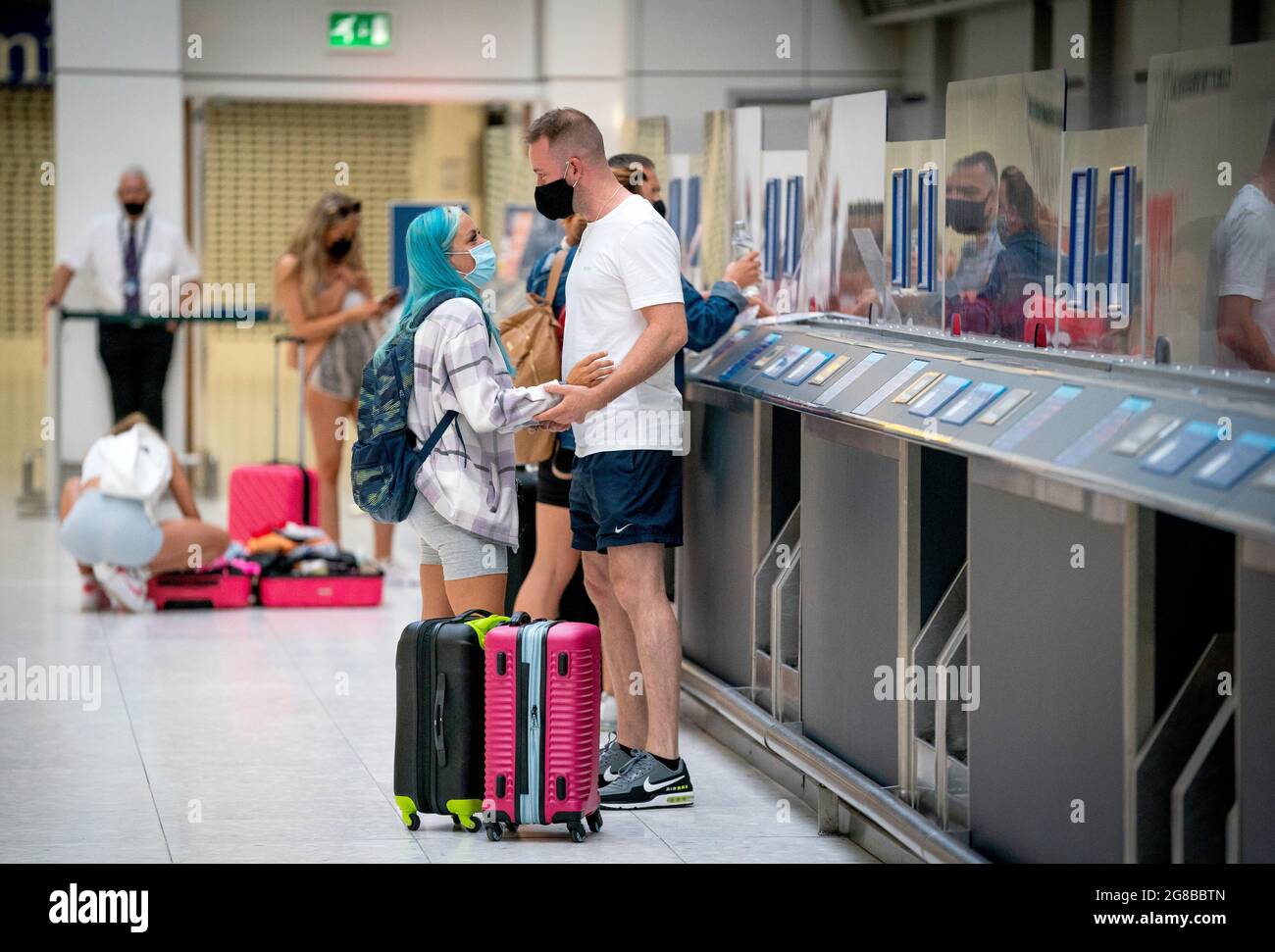 Holidaymakers check-in for the 7.15 Jet2 flight to Ibiza at Glasgow ...