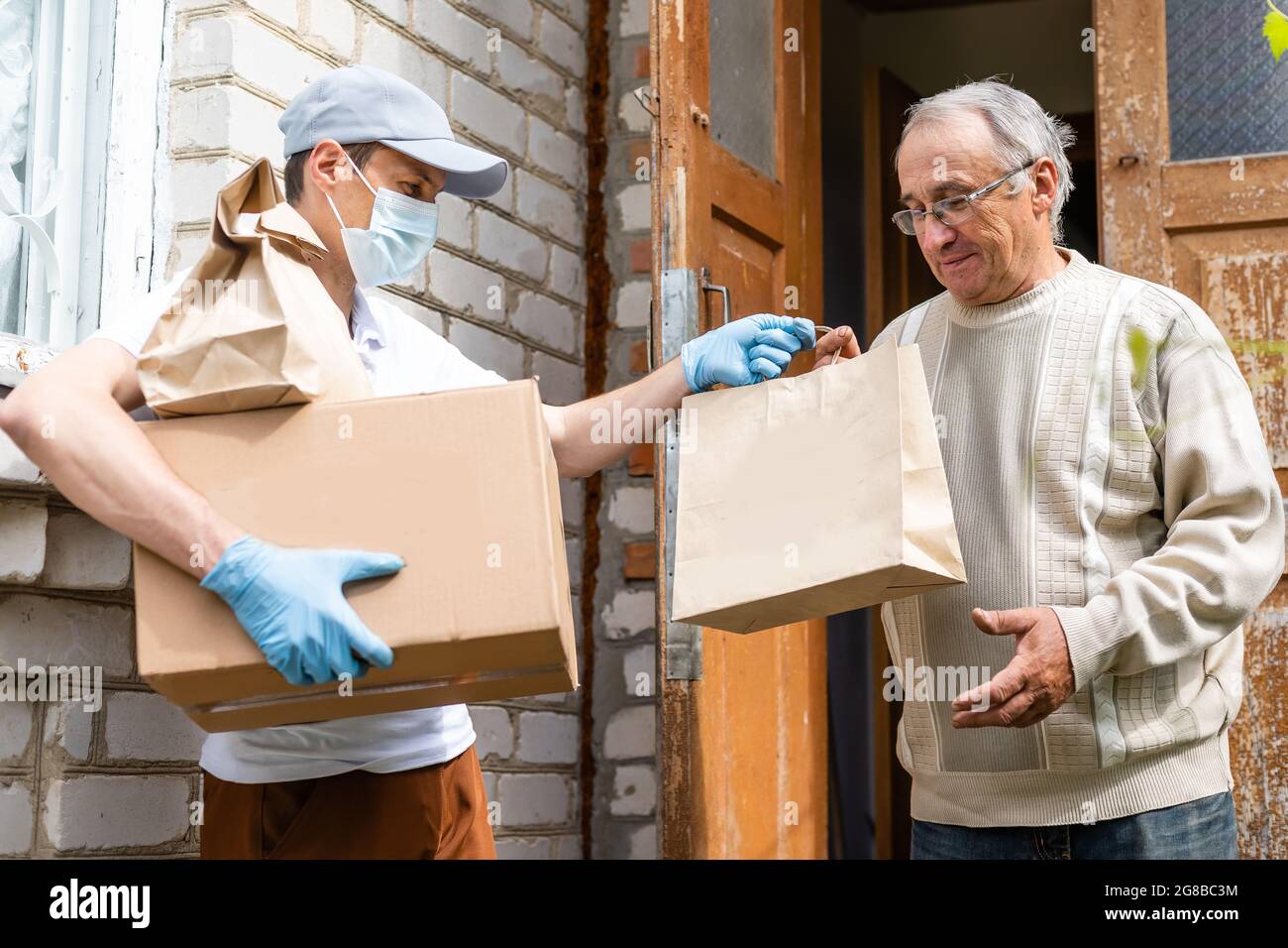 Delivering groceries to the elderly hi-res stock photography and images ...