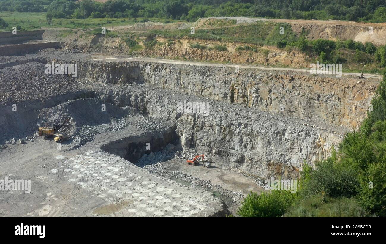 Quarry for the extraction of granite. Granite quarry Stock Photo - Alamy
