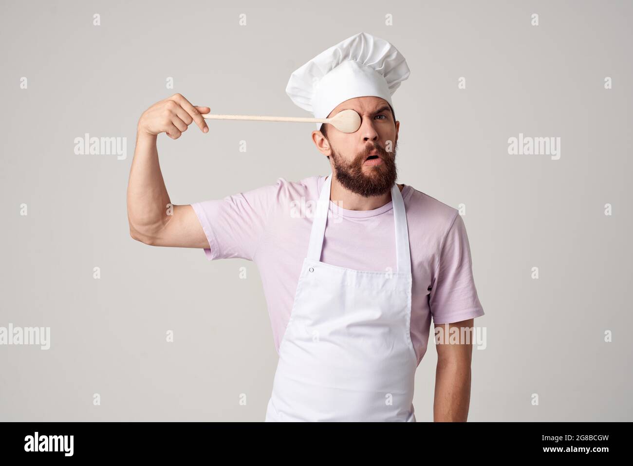 chef in the kitchen with a spoon in hand emotion cooking isolated ...