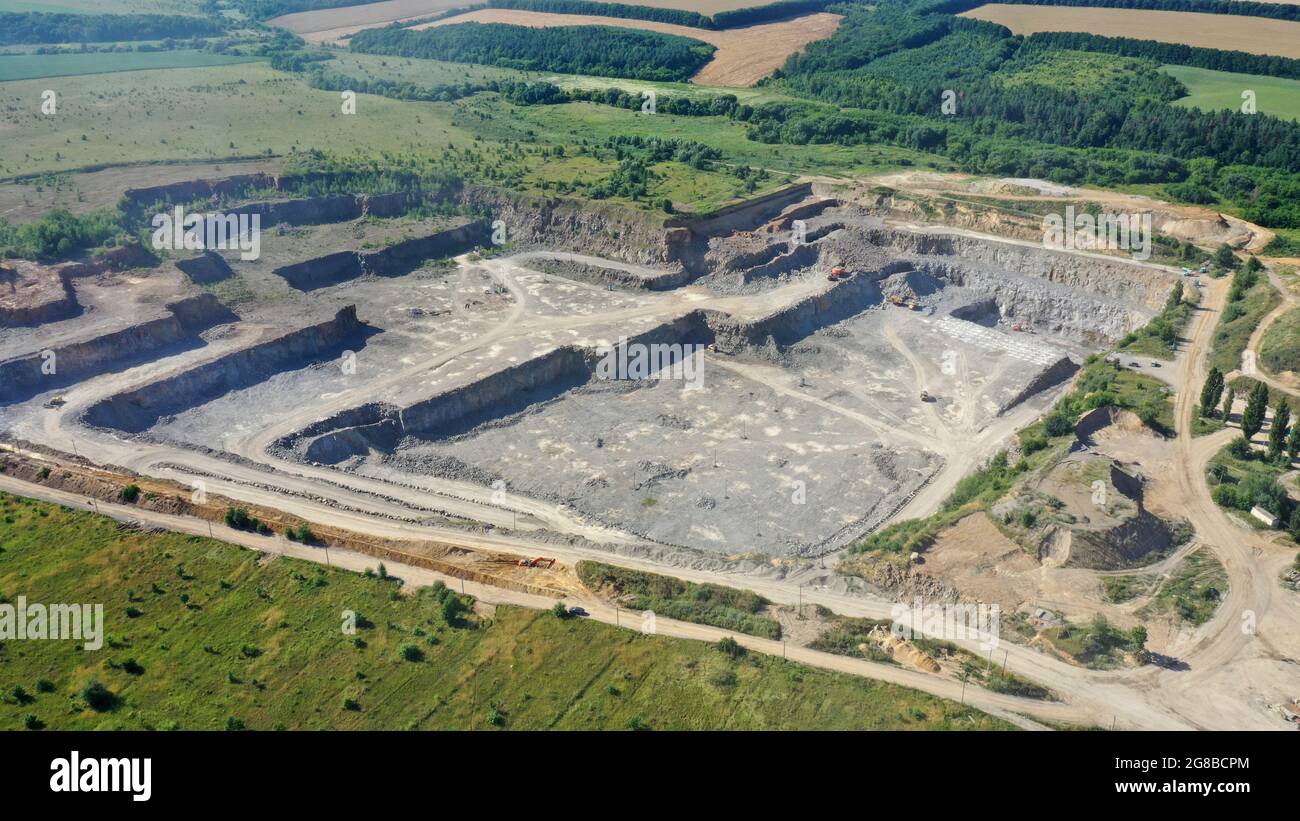 Quarry for the extraction of granite. Granite quarry Stock Photo - Alamy