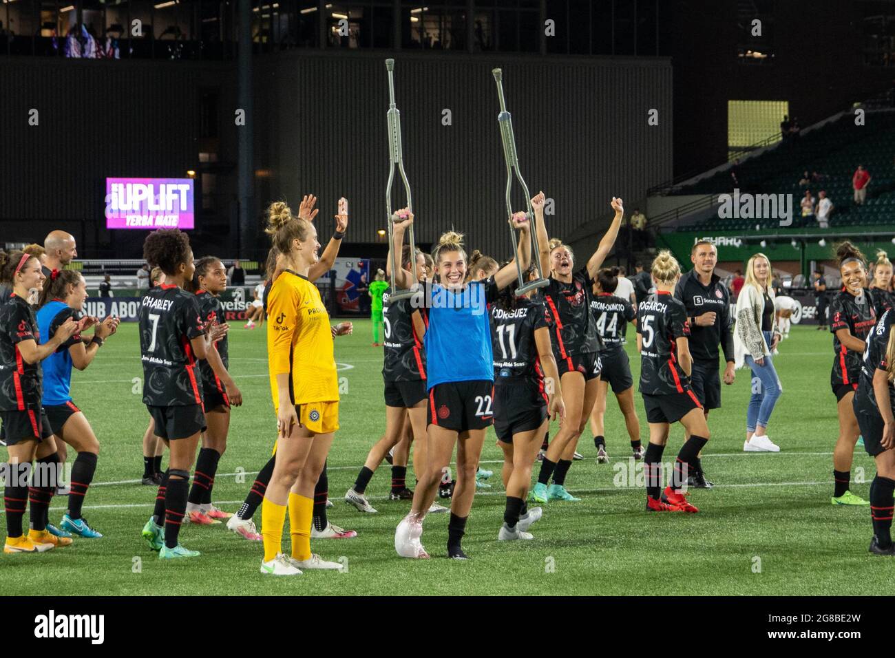 Morgan Weaver (22 Portland Thorns) celebrating the win with fans after ...