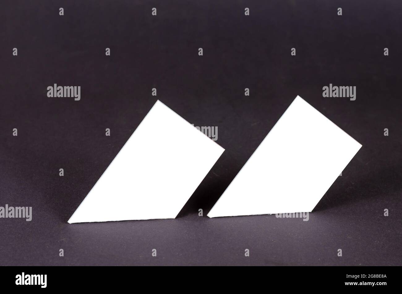 Abstract geometric composition of white quadrangles on a gray ...