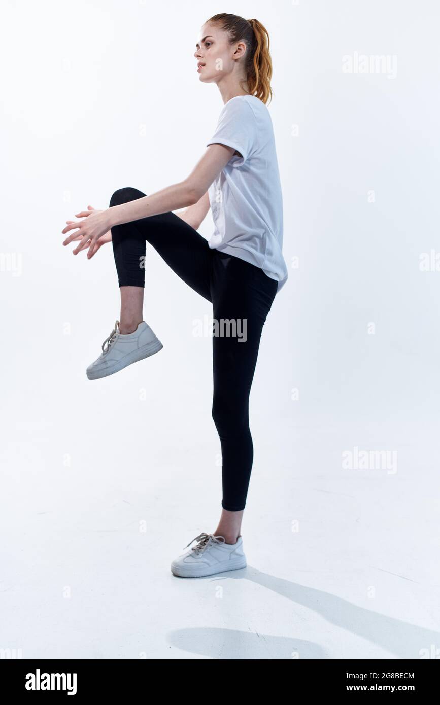 woman in sports uniform workout slim figure exercise Stock Photo - Alamy