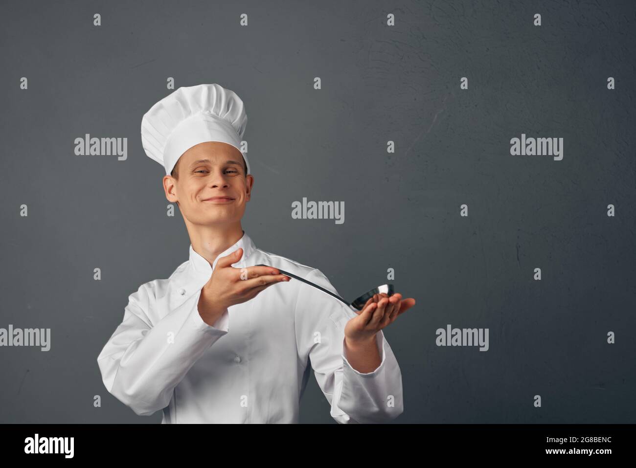 chef with items for cooking food working profession Stock Photo - Alamy
