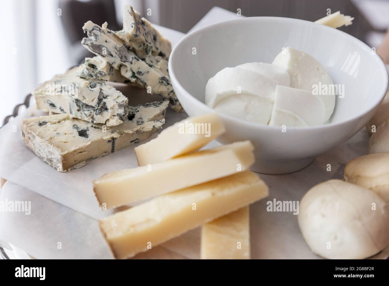 Close up of plate of typical italian cheese gorgonzola, mozzarella ...