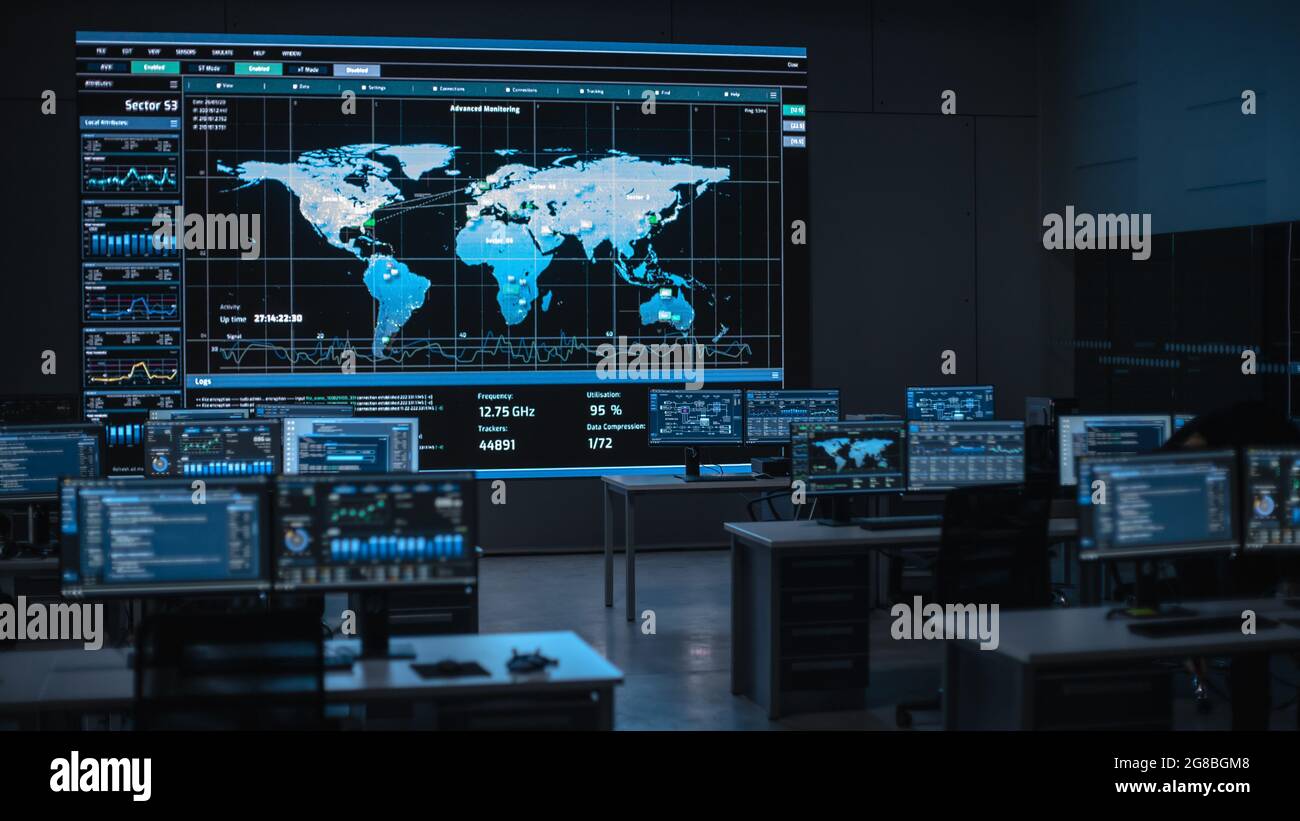 Shot of a Big Empty Data Monitoring Center with Global Map on a Big Digital Screen. Center of ...