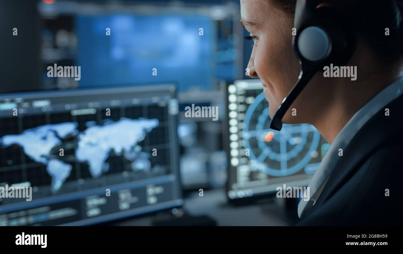 Computer Screen with Global Map Technology Used by a Female Flight ...