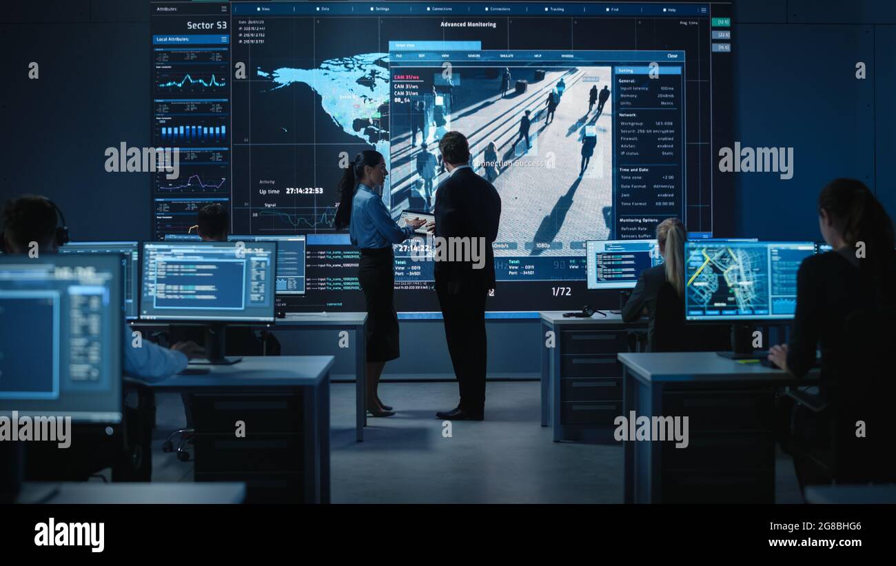 Middle Aged Male and Female Government Officers Discuss Working Matters ...