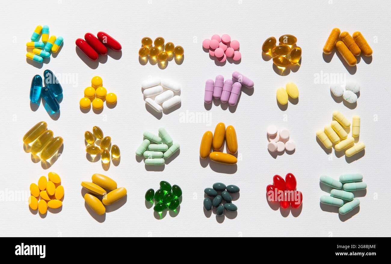Group of assorted pharmaceutical medicine pills, colorful tablets and ...