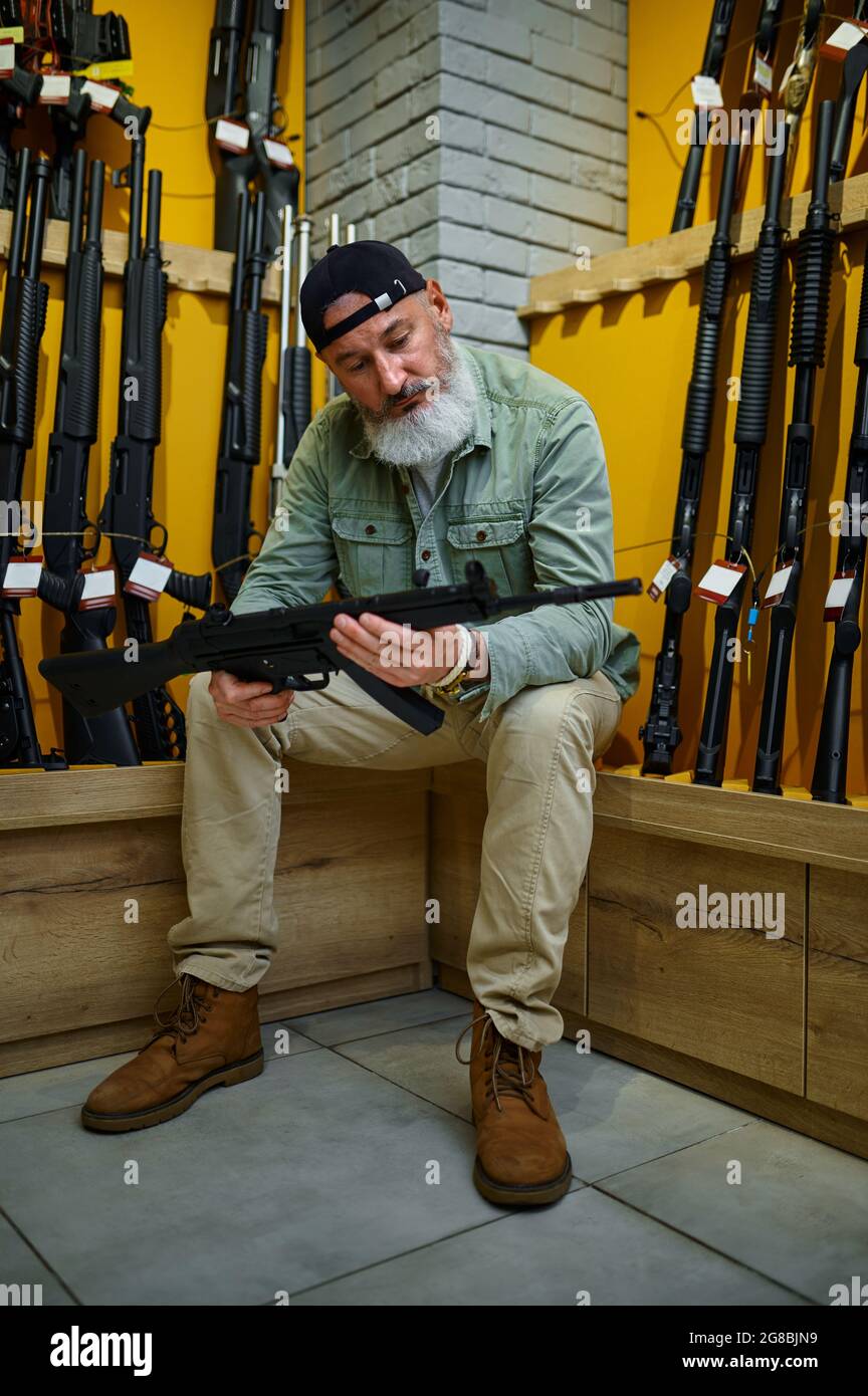 Bearded man with gun hi-res stock photography and images - Alamy
