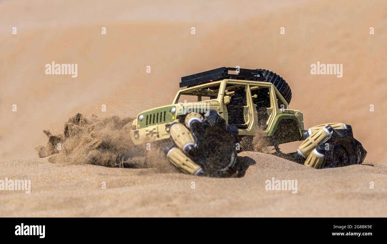 Radio controlled buggy car with electric engine on sand. Off road rally ...
