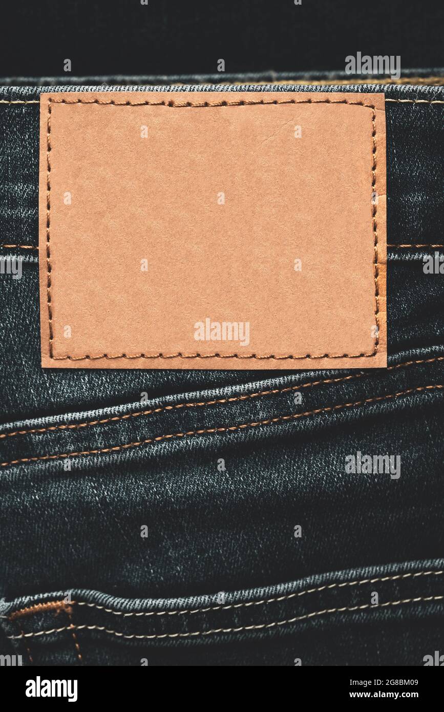 Blank leather label on new jeans trousers Stock Photo - Alamy