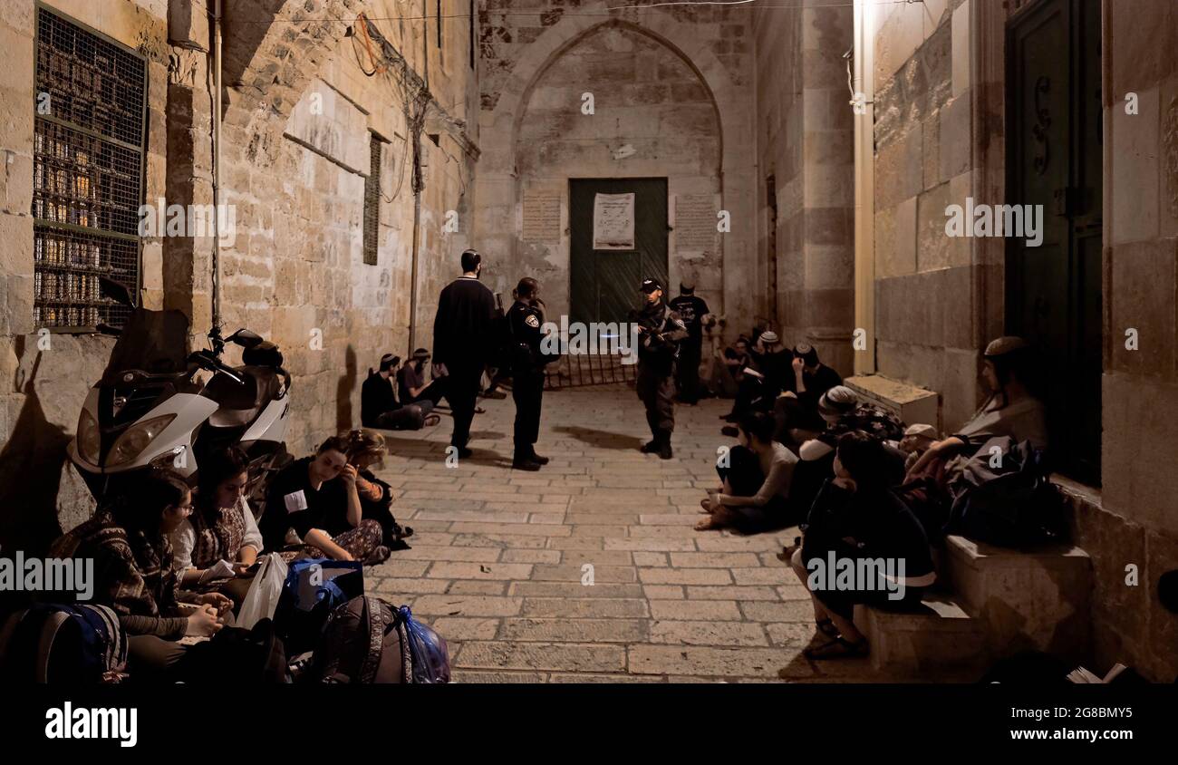 Religious Jews gathered as they mourn at the Iron Gate ( Arabic: Bab al ...