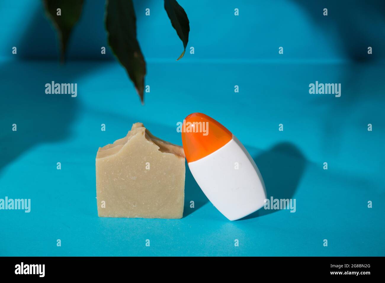 Hand made soaps in different shapes on the blue decorative background ...