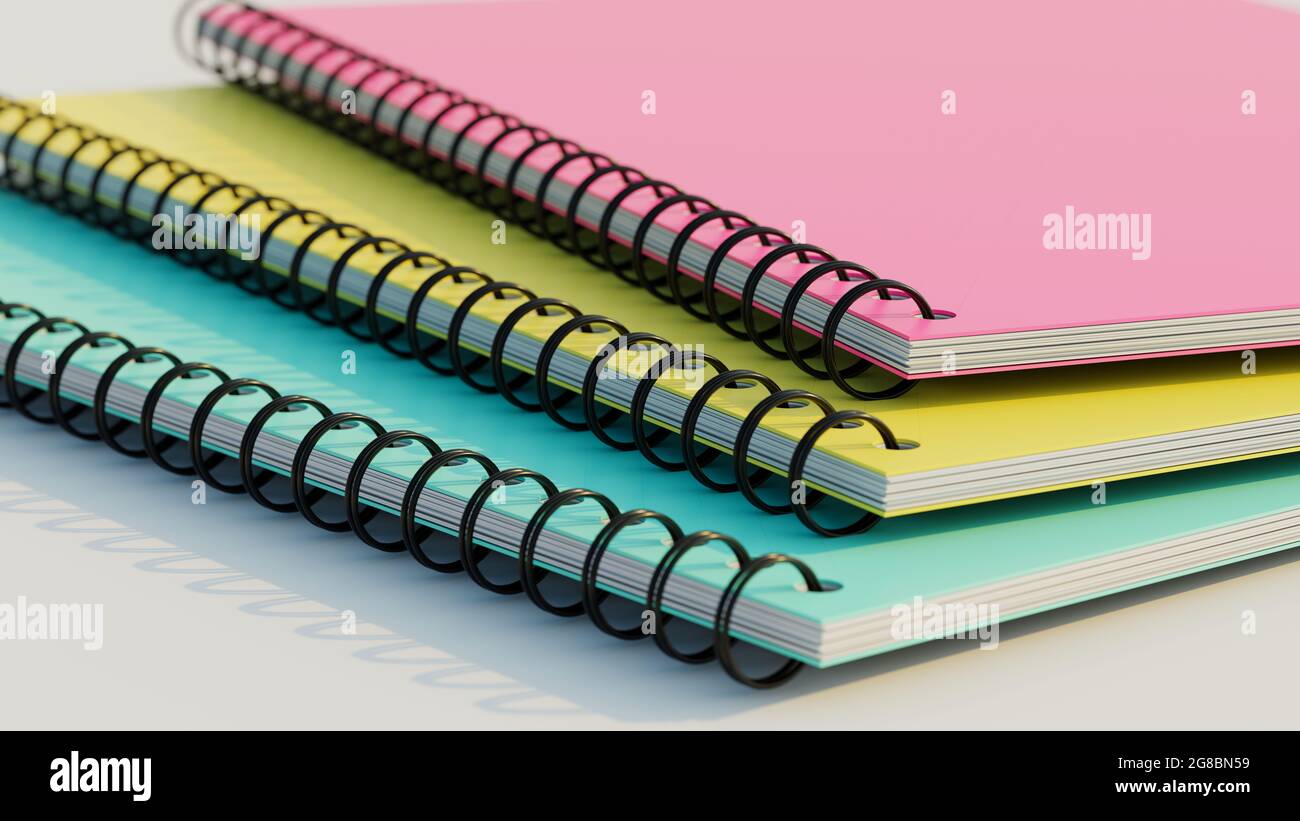 Stacked spiral binder notebooks. Blank colourful notebooks. Closeup ...
