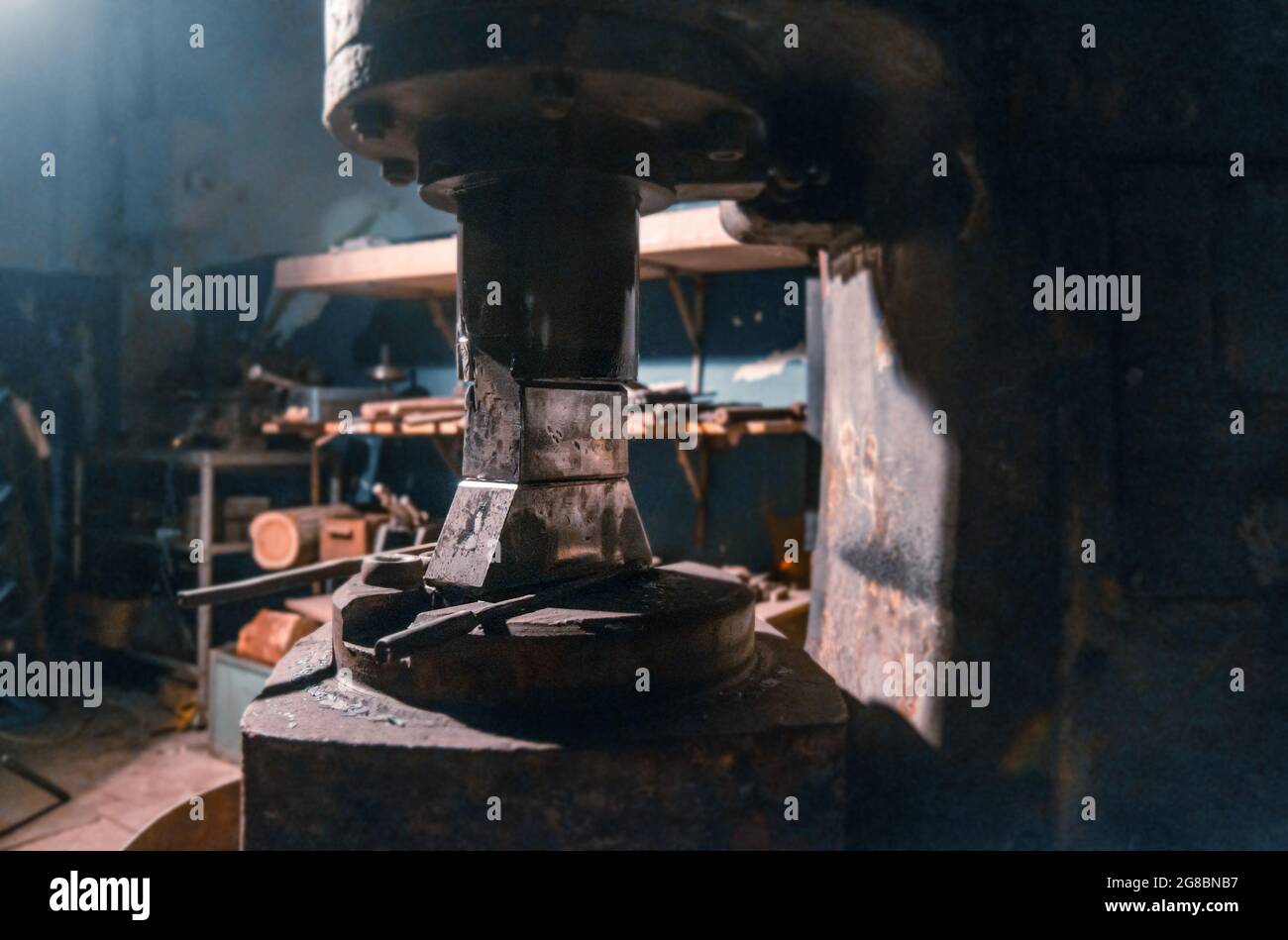 General view of an old percussion machine for forging various metals in ...