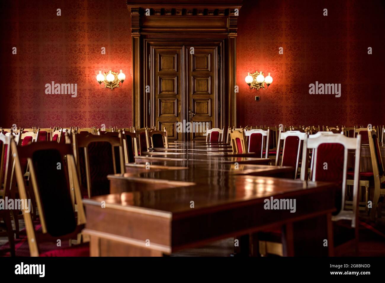 Vintage hall interior with tables and chairs in burgundy color Stock ...