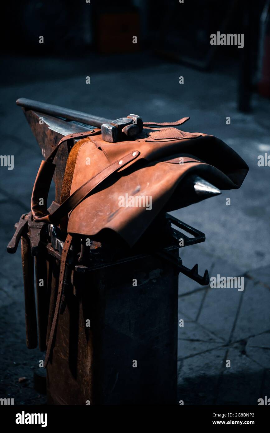Blacksmith's Leather Apron on Anvil Stock Photo - Alamy