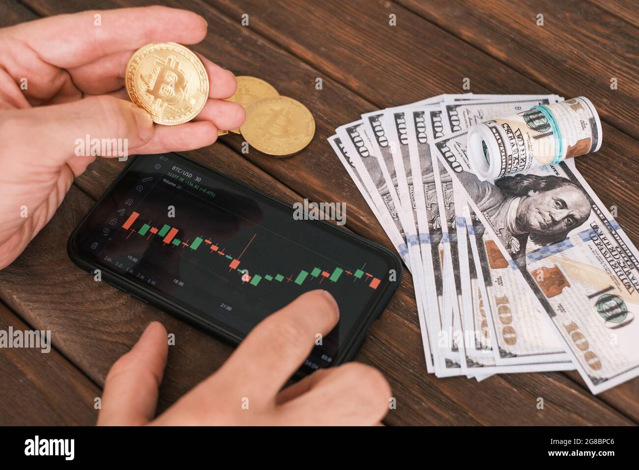 Investor analyzes the cryptocurrency rate chart Stock Photo - Alamy