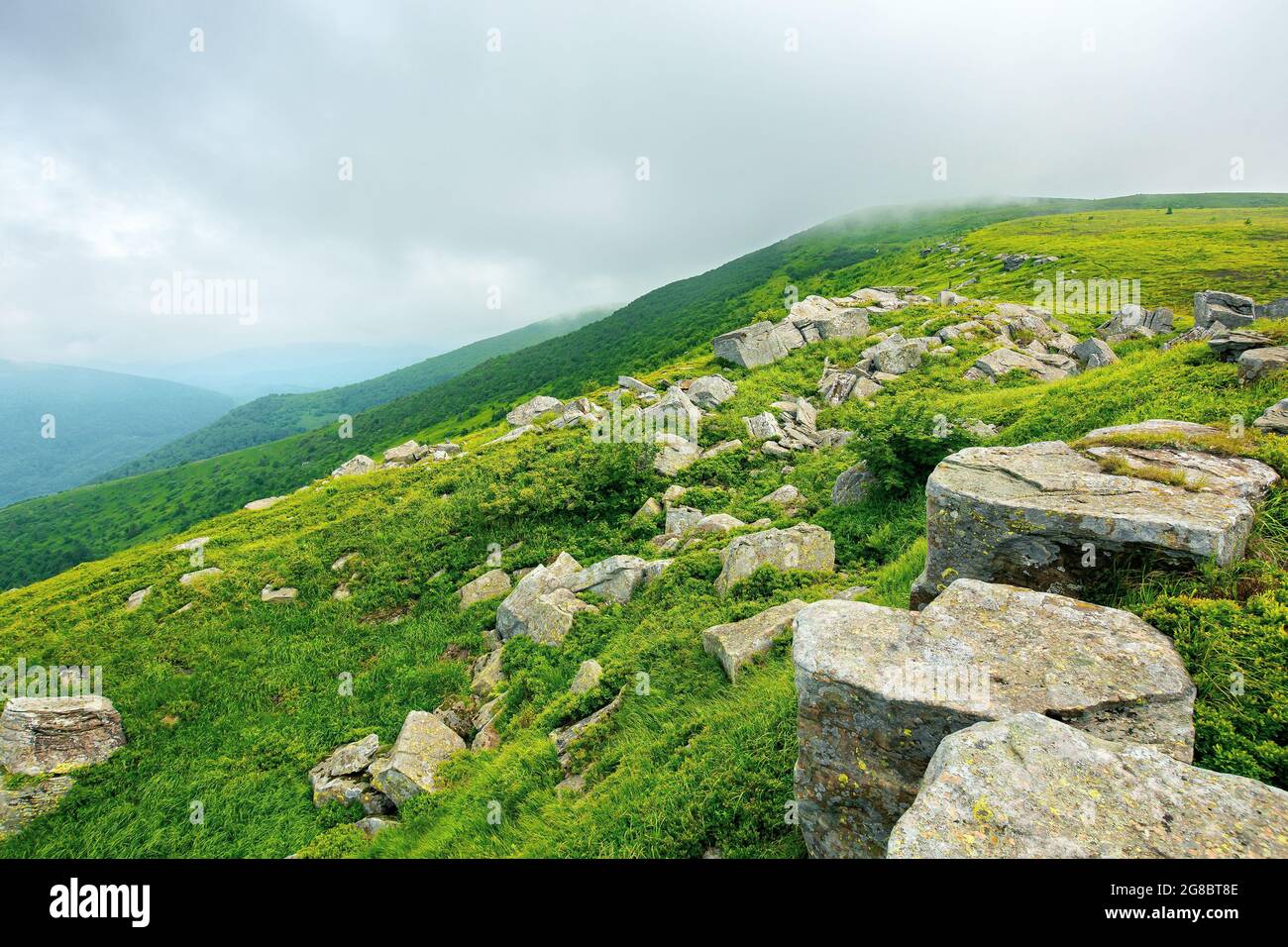alpine mountain scenery in summer. cloudy weather. stones and boulders ...