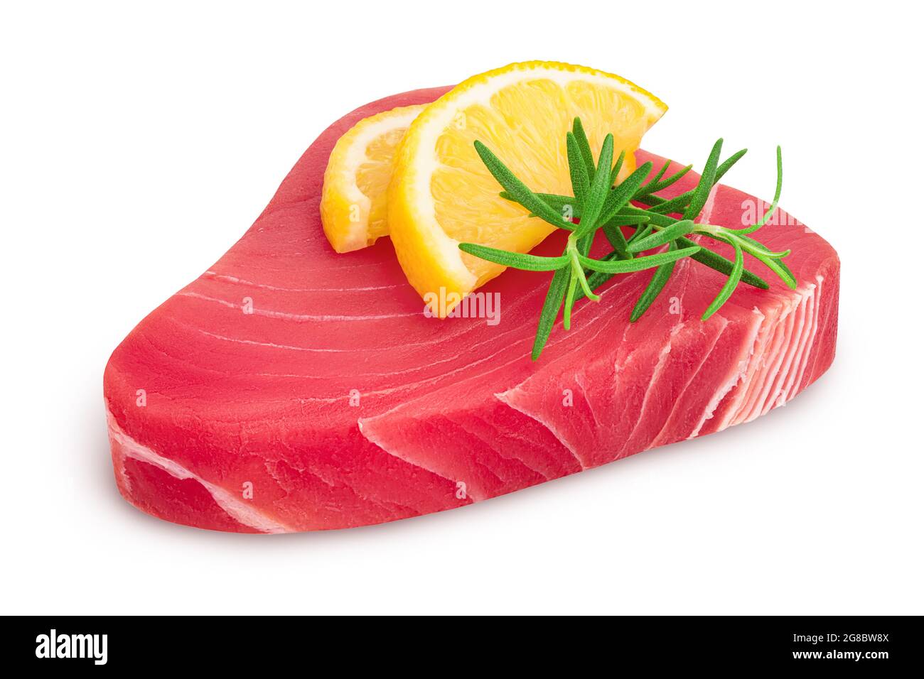 Fresh tuna fish fillet steak with rosemary and lemon isolated on white ...