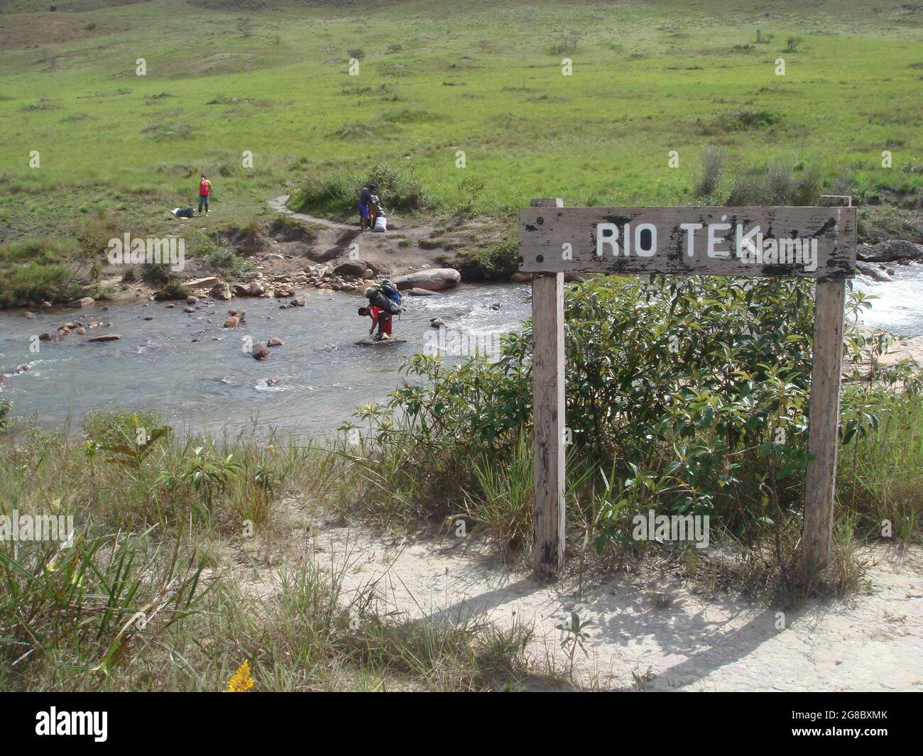 Closeup shot of the "Rio Tek" wooden sign in Ciudad Bolivar, Venezuela ...