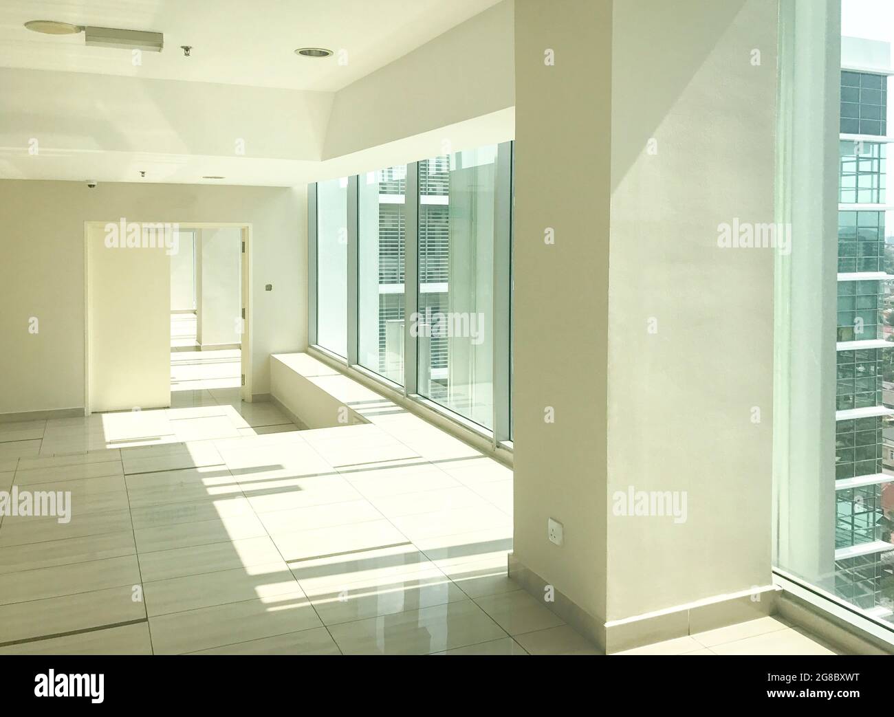 Empty corridor in modern office building. Copy space Stock Photo - Alamy