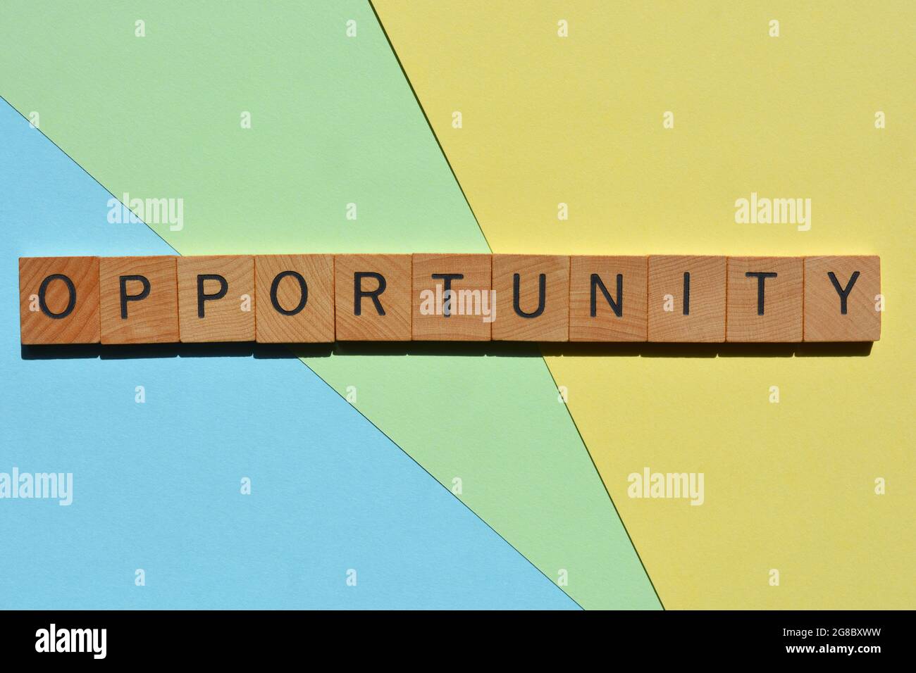 Opportunity, word in wooden alphabet letters isolated on background as ...