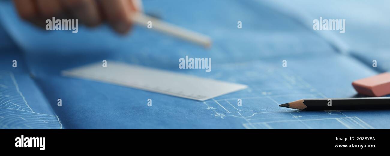 Black pencil lying on drawing of house project closeup. Architecture ...