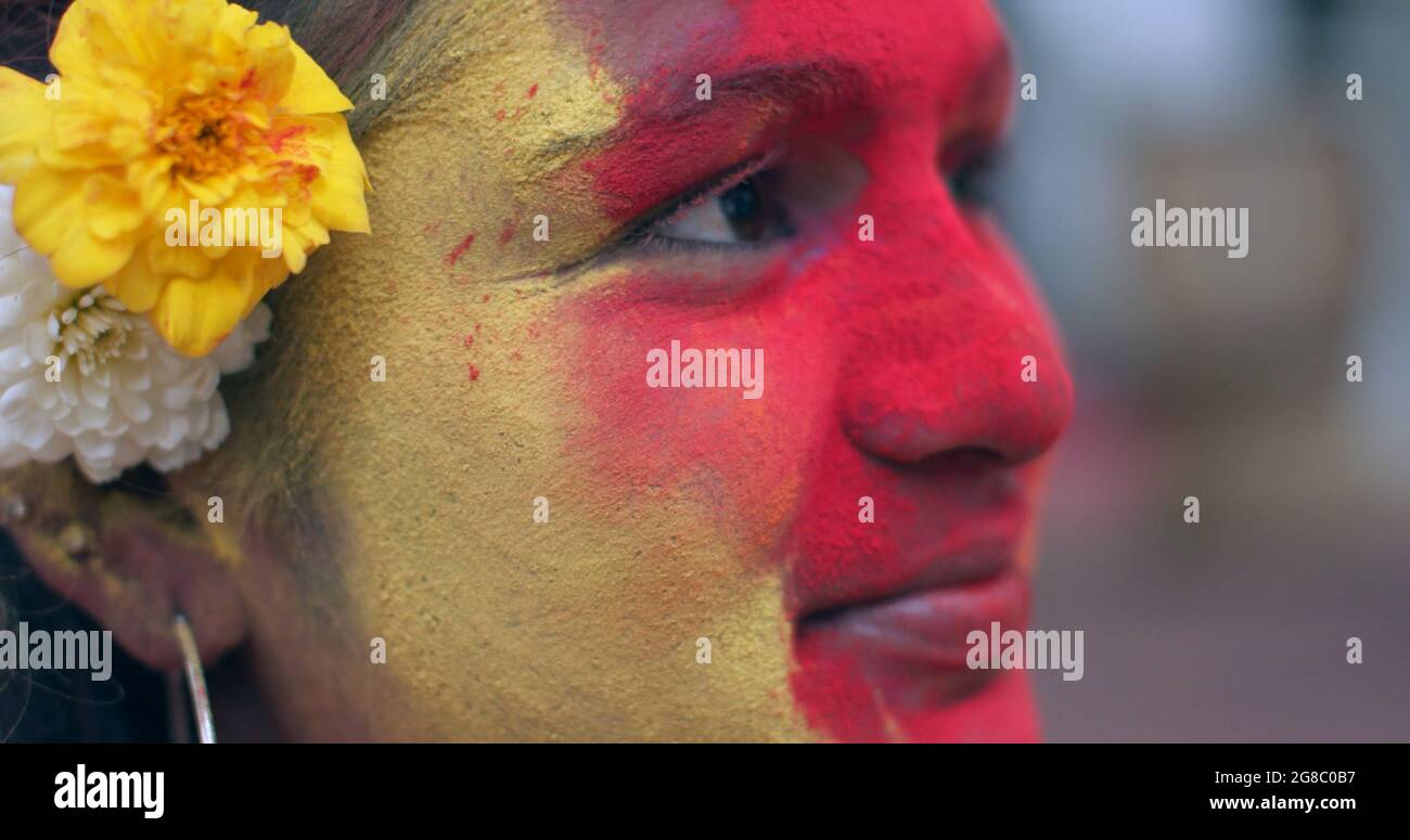 Portrait of a female with a painted dress during the Holi Hindu ...