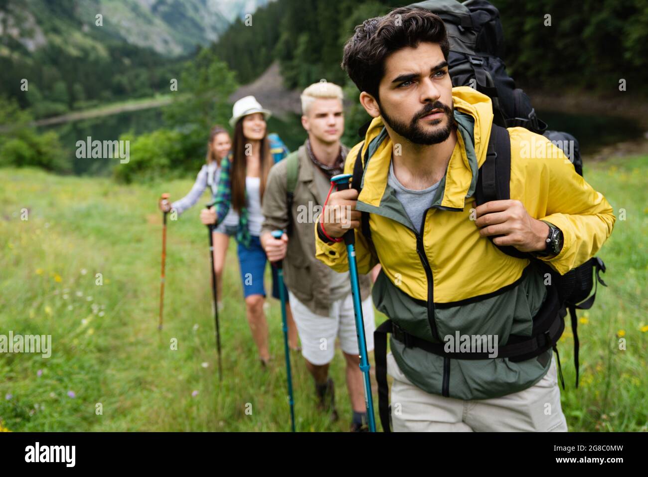 Hard, difficult, tiring and exhausting expedition of friends. Trekking ...