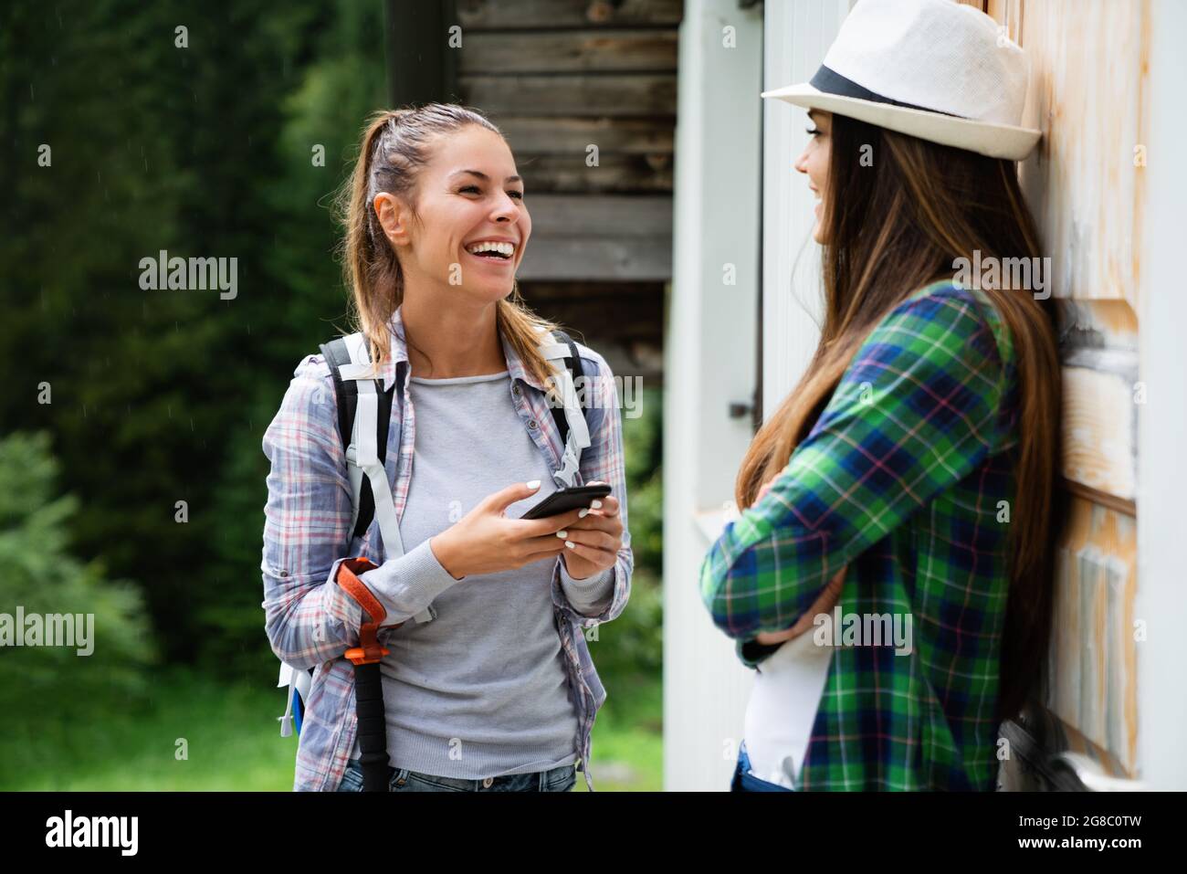 Friends hanging out and having fun together during hiking Stock Photo ...