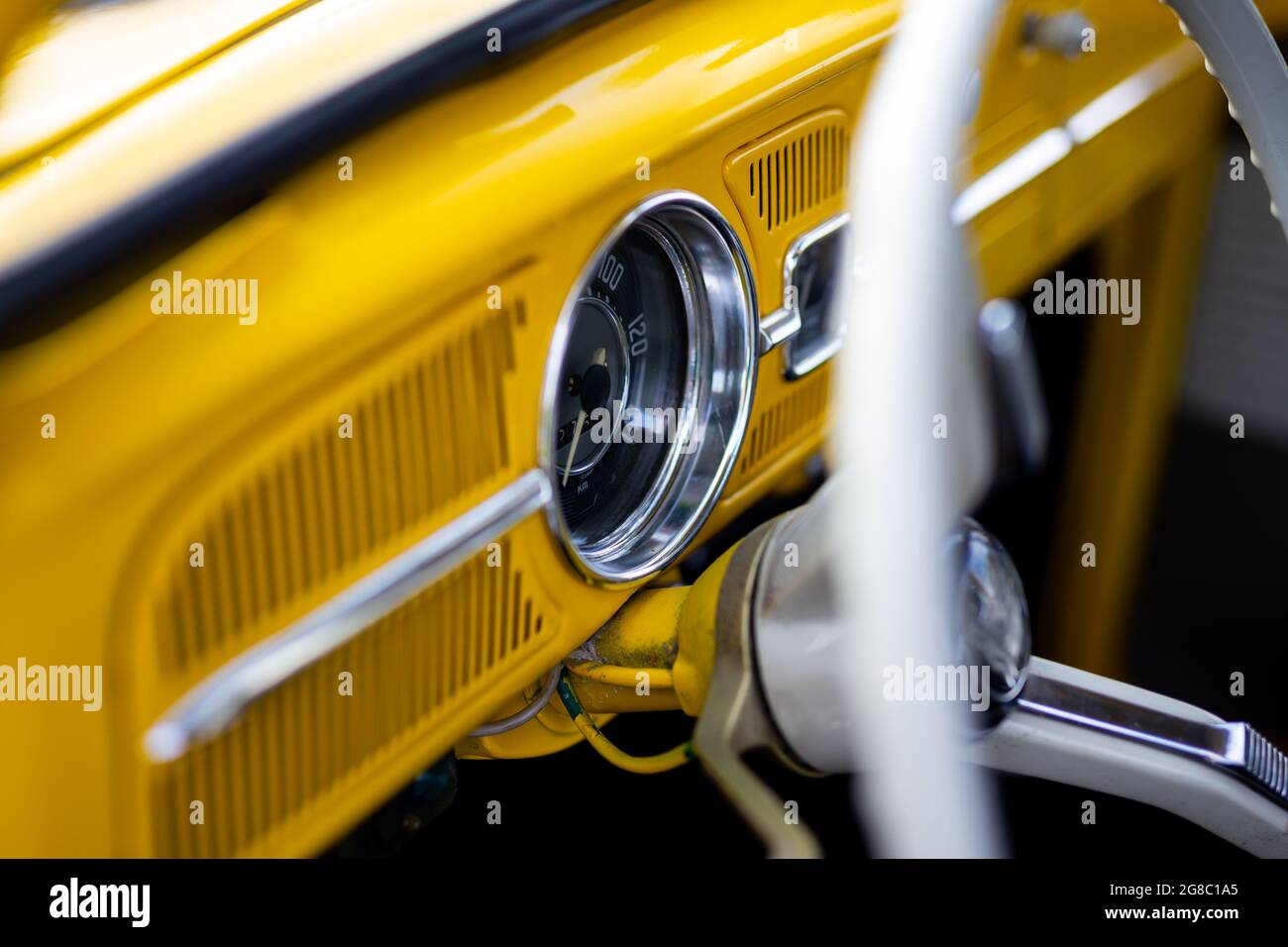 Restored yellow classic car interior. Photo taken in natural light ...