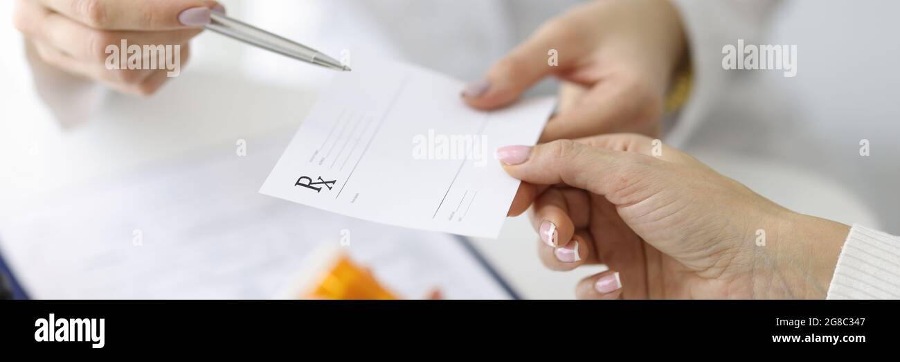 Doctor giving patient paper prescription for medicine closeup Stock ...