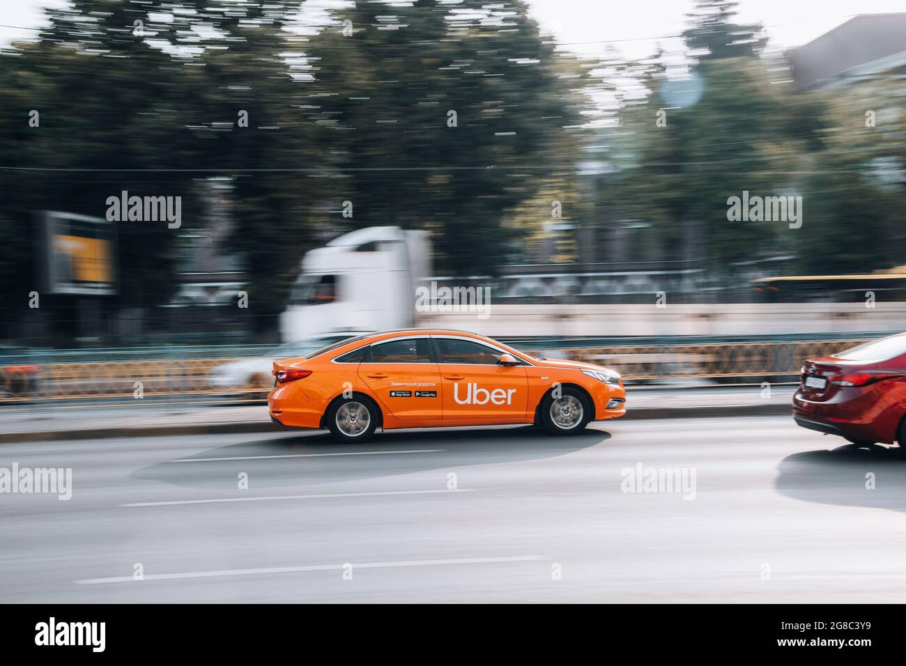 Ukraine, Kyiv - 16 July 2021: Orange Hyundai Sonata Taxi Uber car ...