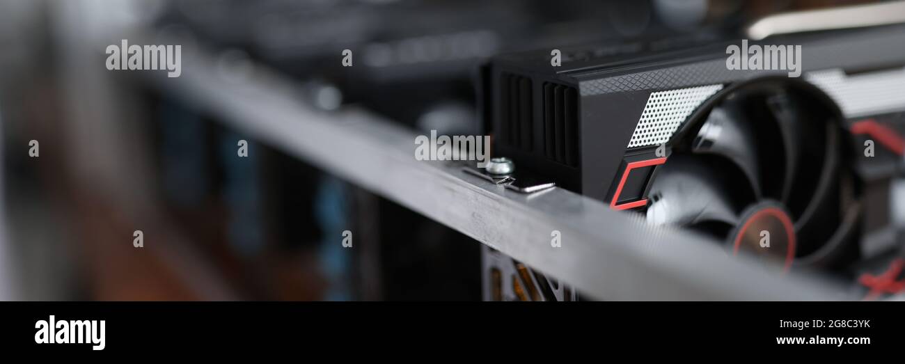 Master repairing video card from mining farm closeup. Electronics ...