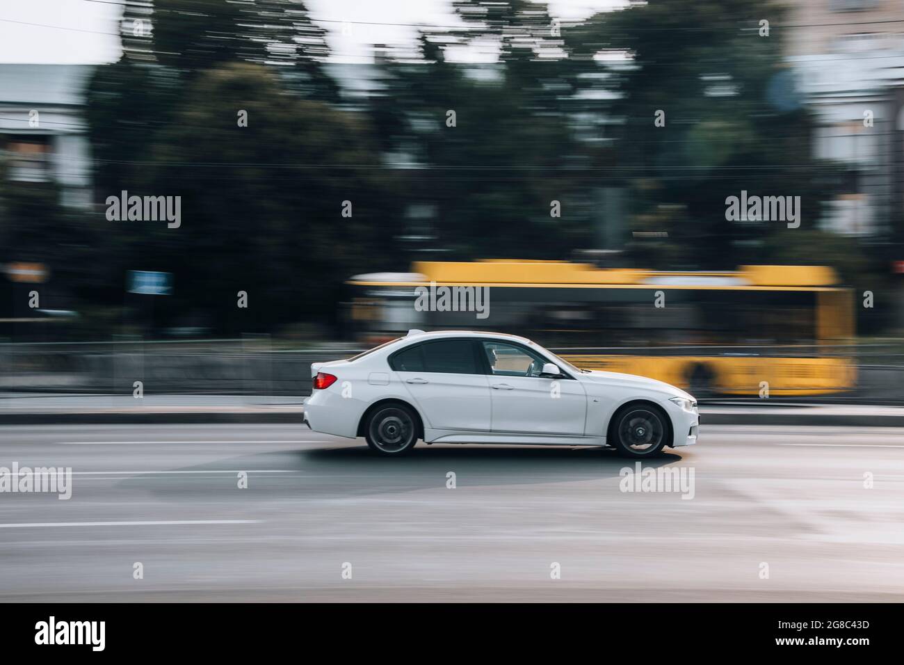 Ukraine, Kyiv - 16 July 2021: White BMW 3 series car moving on the ...