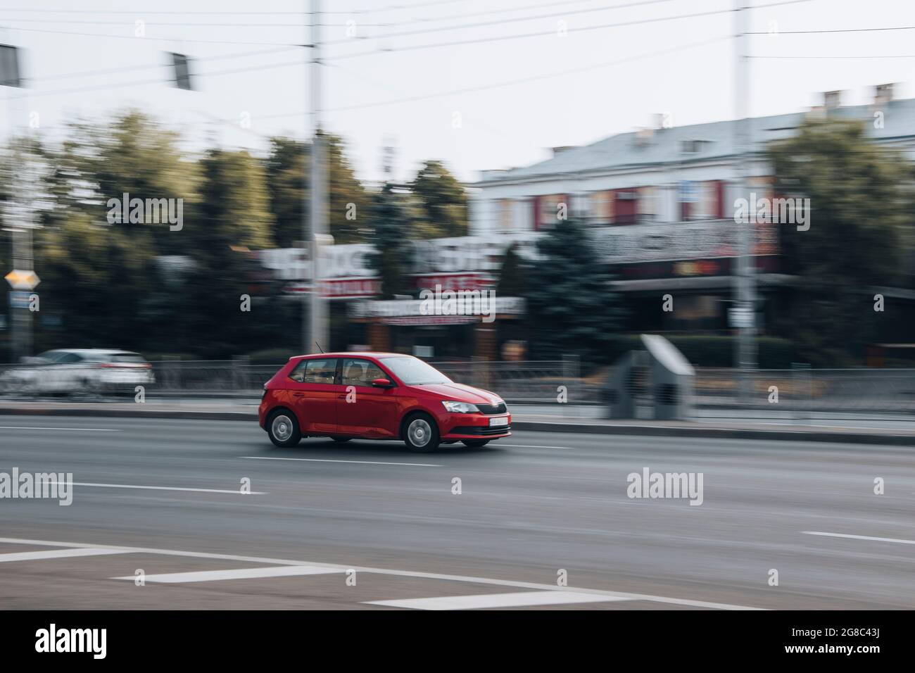 Ukraine, Kyiv - 16 July 2021: Red Skoda Fabia car moving on the street ...