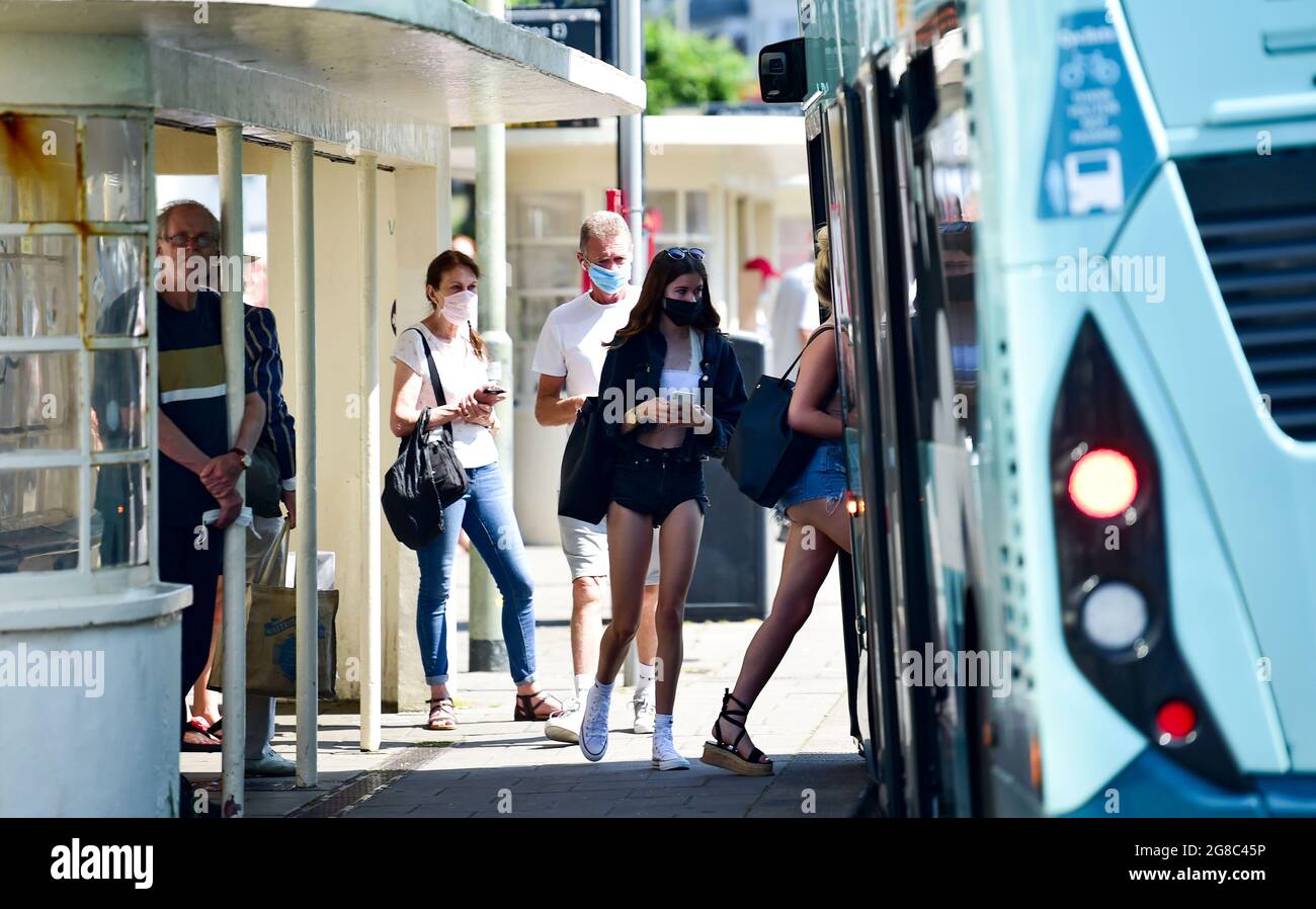 Brighton UK 19th July 2021 - Bus passengers continue to wear face ...