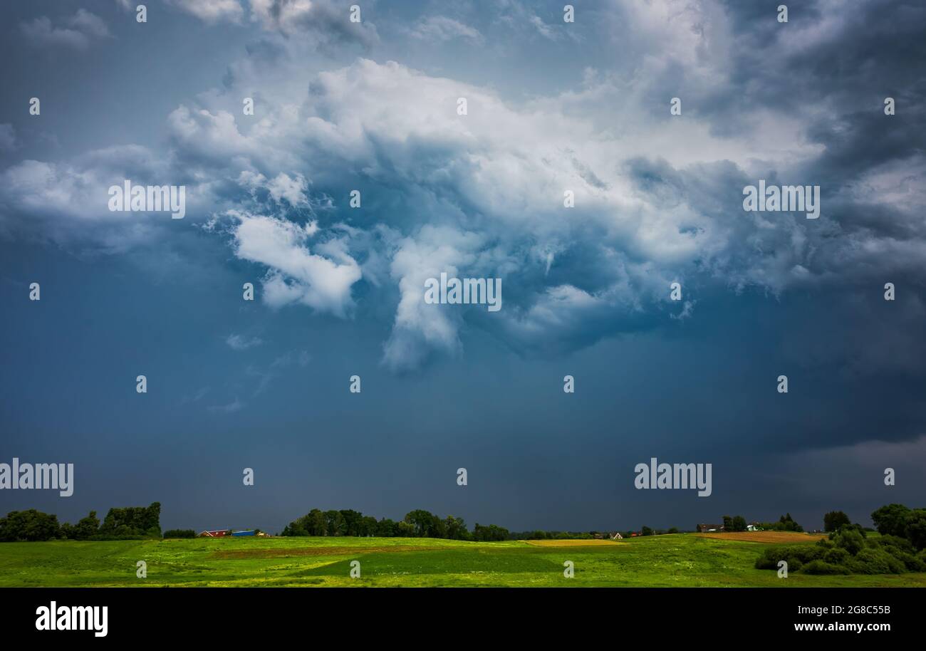Extreme thunderstorm supercell with white hail core, hail falling on a ...