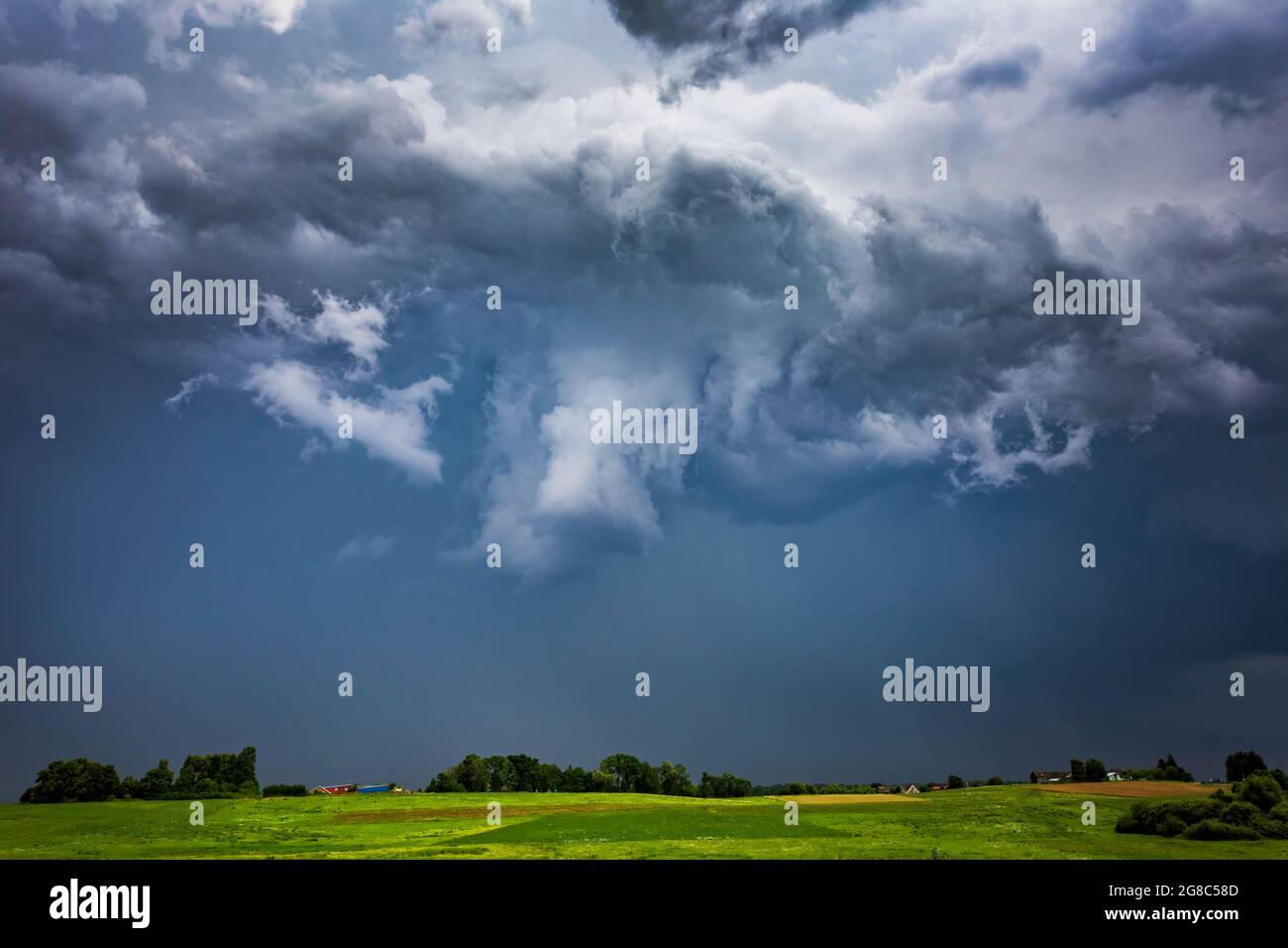Extreme thunderstorm supercell with white hail core, hail falling on a ...