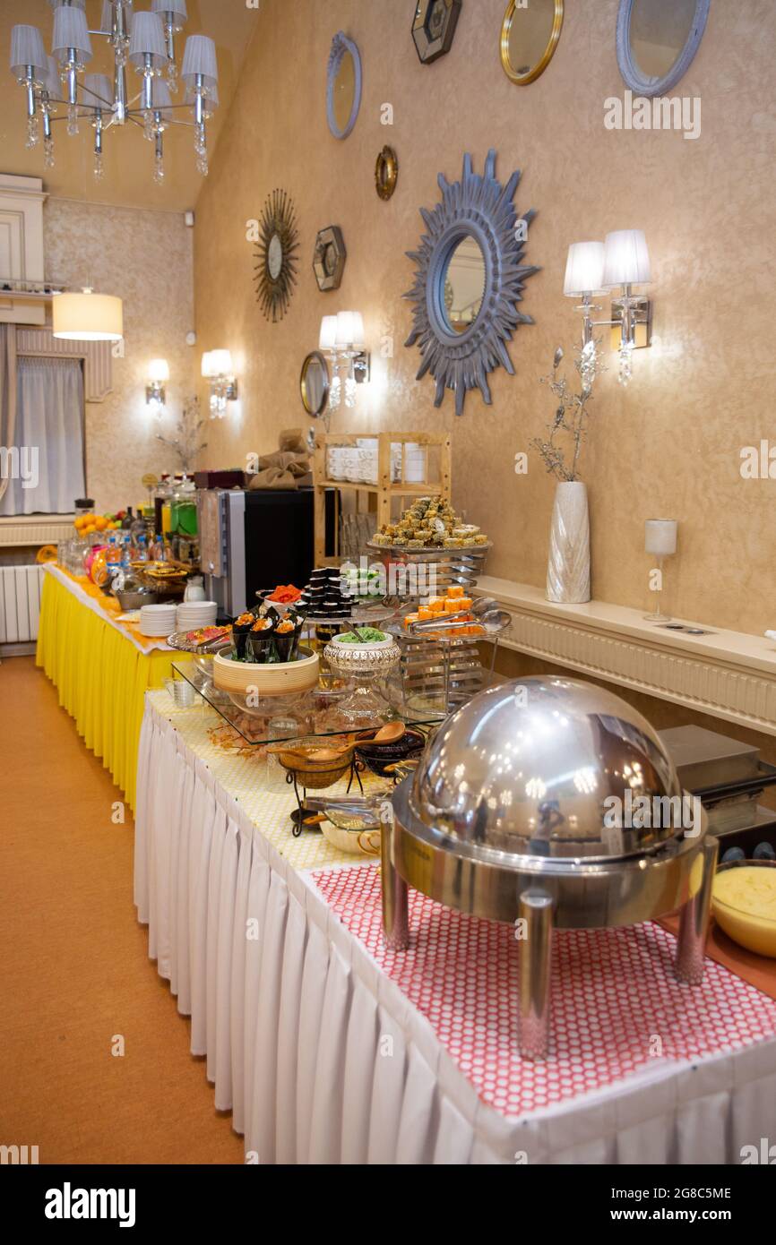 Buffet table in the hotel with various dishes Stock Photo - Alamy