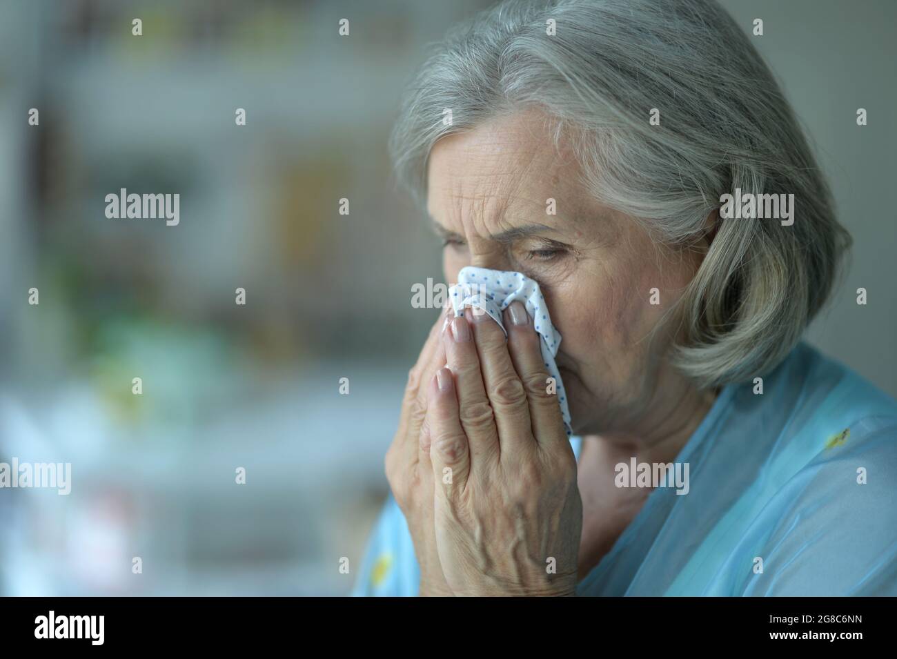 Pensive sick mature woman hi-res stock photography and images - Alamy