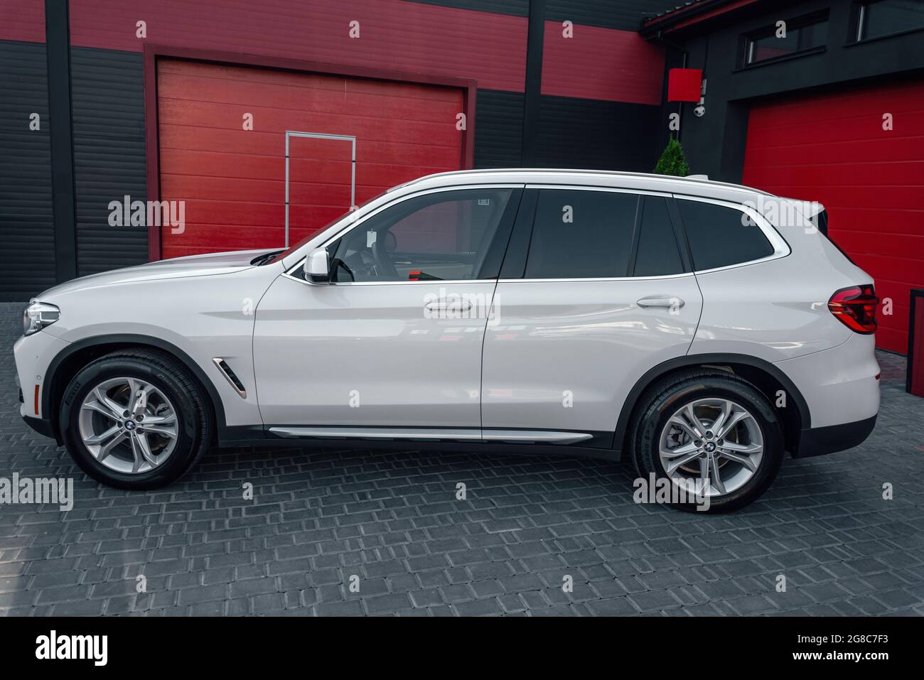 Ukraine, Odessa July 8 - 2021: White new compact crossover BMW X3, side ...